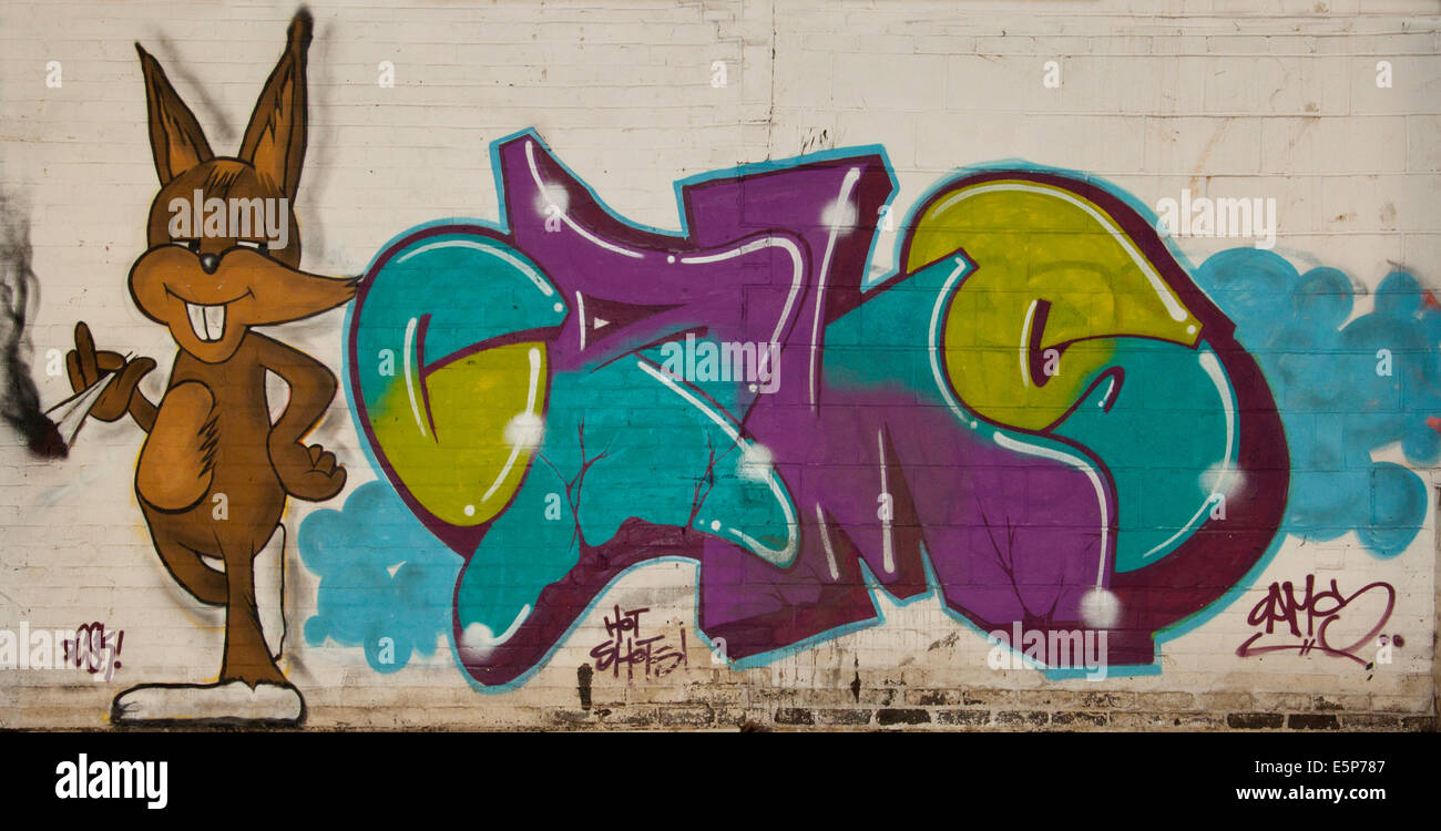 Graffiti depicting a rabbit smoking a joint Stock Photo - Alamy