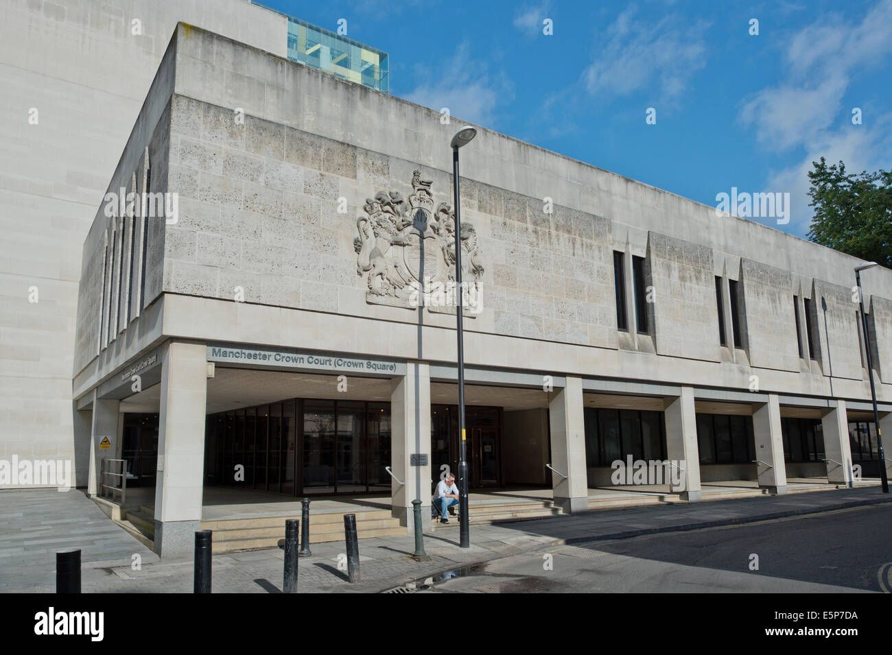 Manchester Crown Court on a sunny day, based in Crown Square in Dolefield, Spinningfields, UK ...