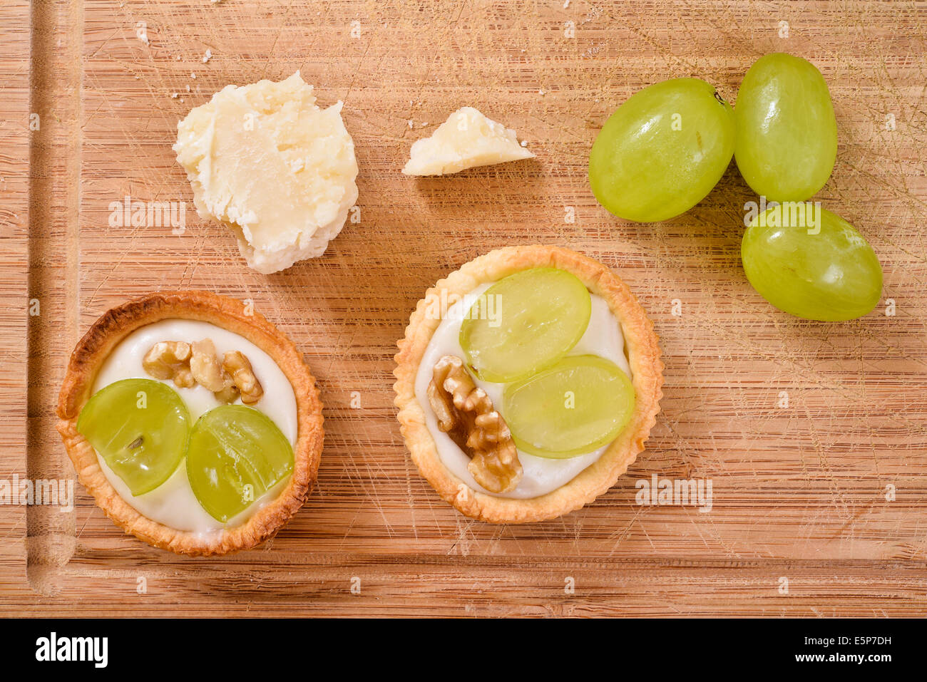 Italian appetizer. Baskets with parmesan cream, decorated with white ...