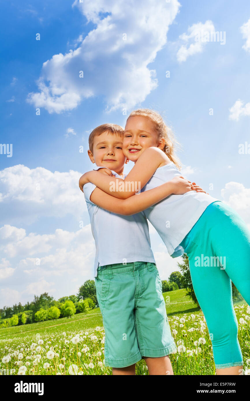 Kids hugging hi-res stock photography and images - Alamy