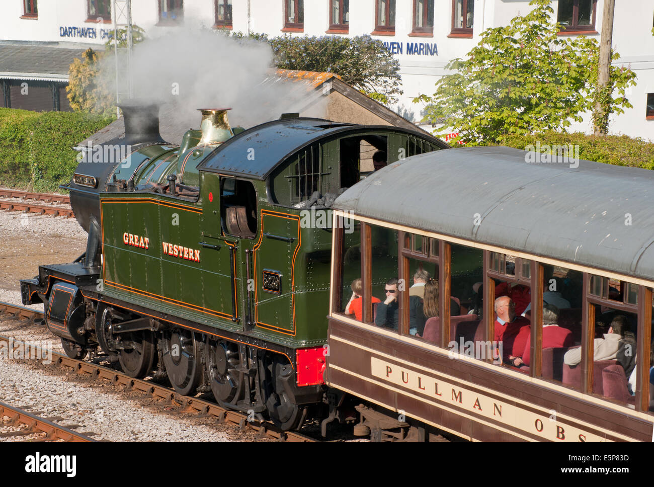 A Great Western steam locomotive leaves Kingswear Station on the South ...