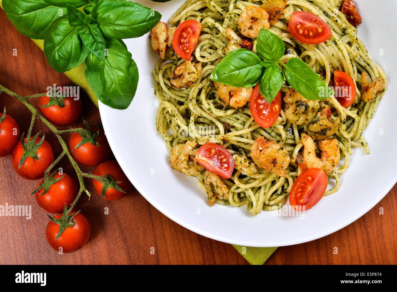 Italian Spaghetti with king prawns and classic basil pesto sauce Stock ...