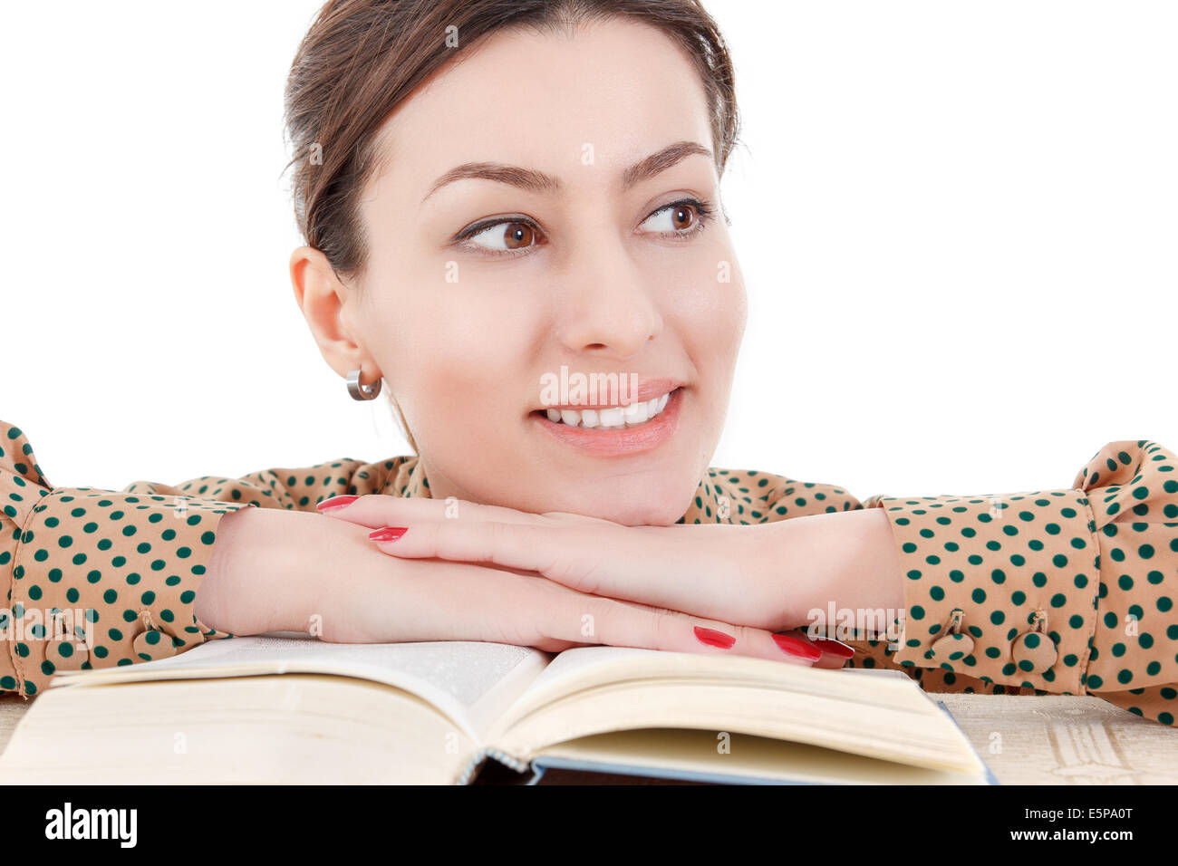beautiful woman in shirt leaning on book looking aside Stock Photo - Alamy