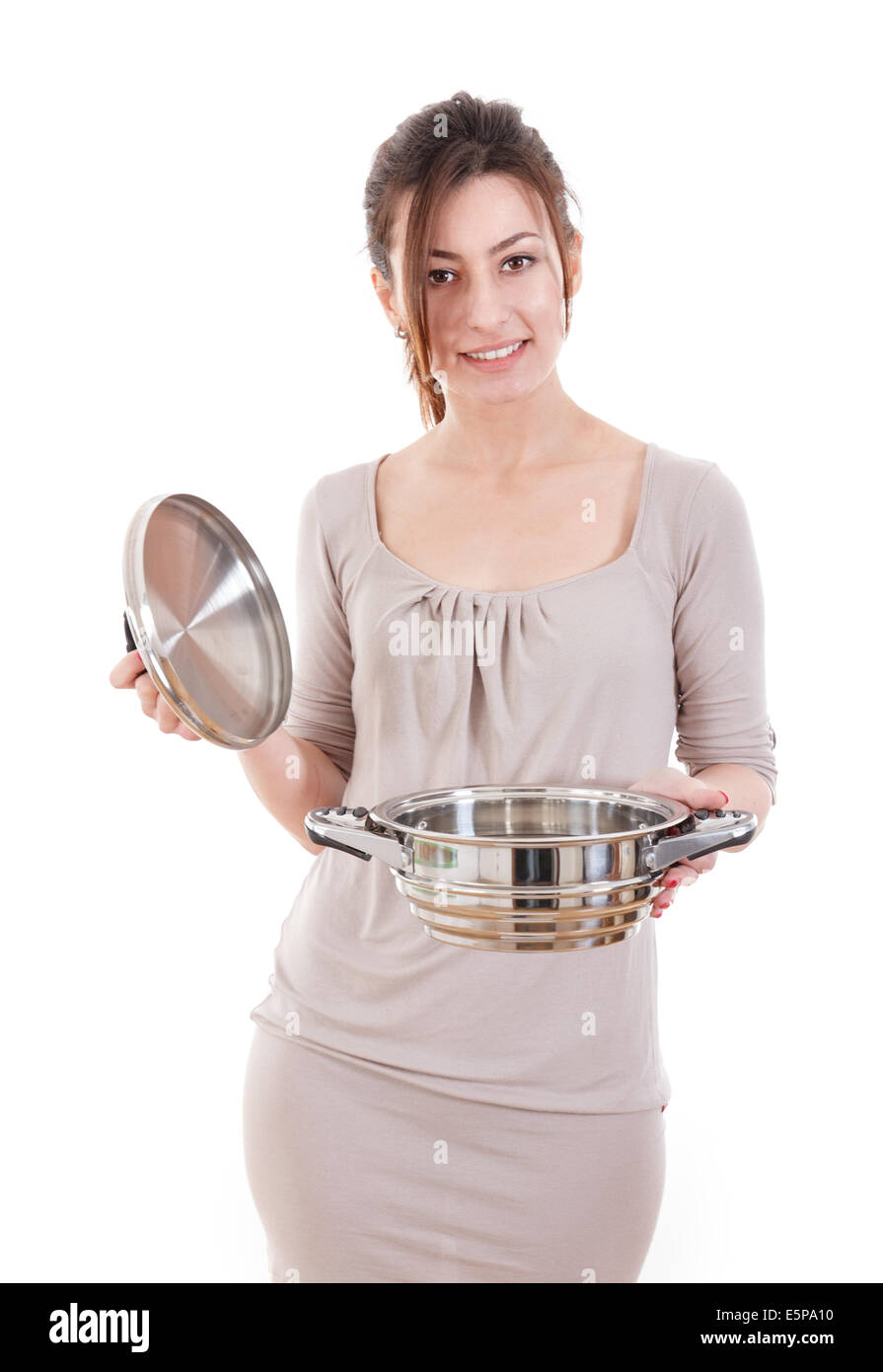 Beautiful young woman housewife opening a pot for cooking Stock Photo ...