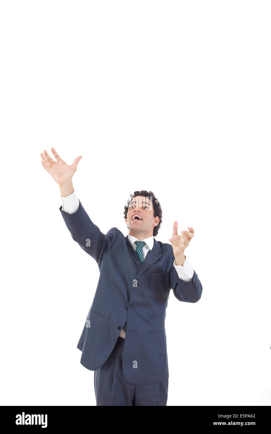 business man reaching to grab something from above his head, man in ...