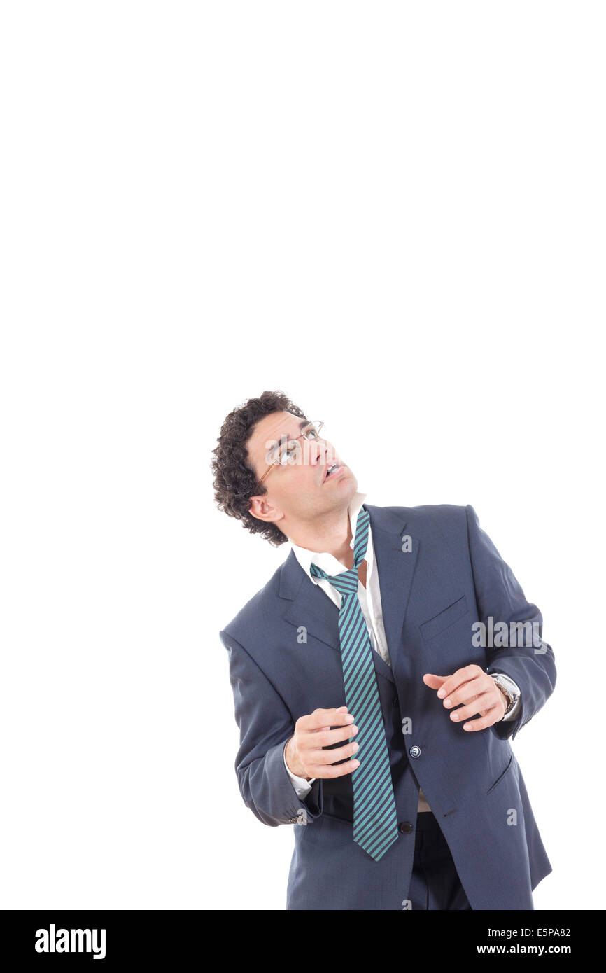 frightened business man looking up, fear of somethnig, mobbing at work ...