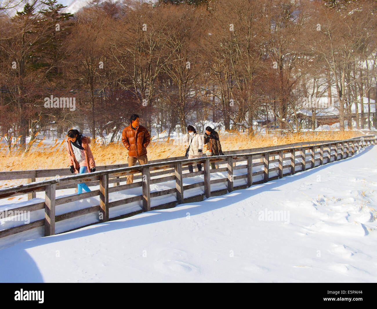 Japanese family braving the cold winter at Yuno Lake, Nikko, Tochigi ...