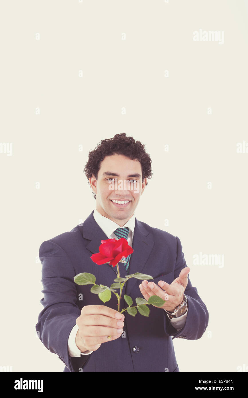 Man red rose in hand hi-res stock photography and images - Alamy