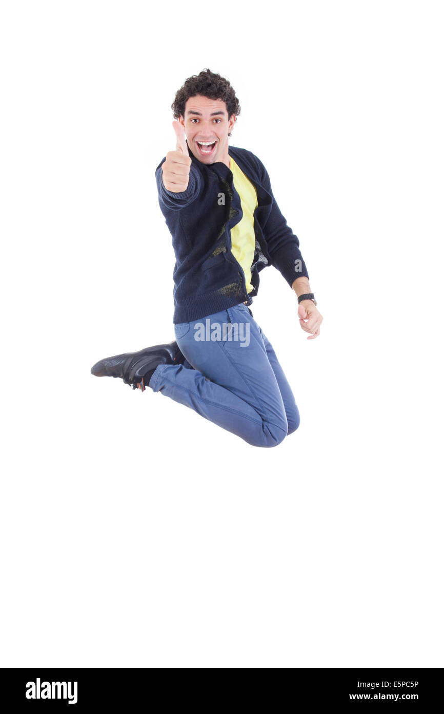 Portrait of young happy expressive caucasian man jumping of joy showing ...