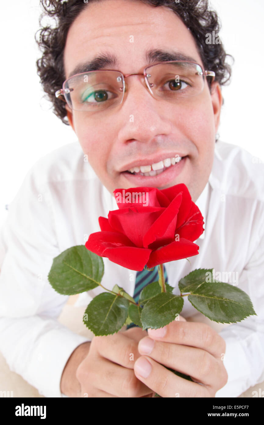 Romantic silly man in love holding red rose, Guy with puppy look ...