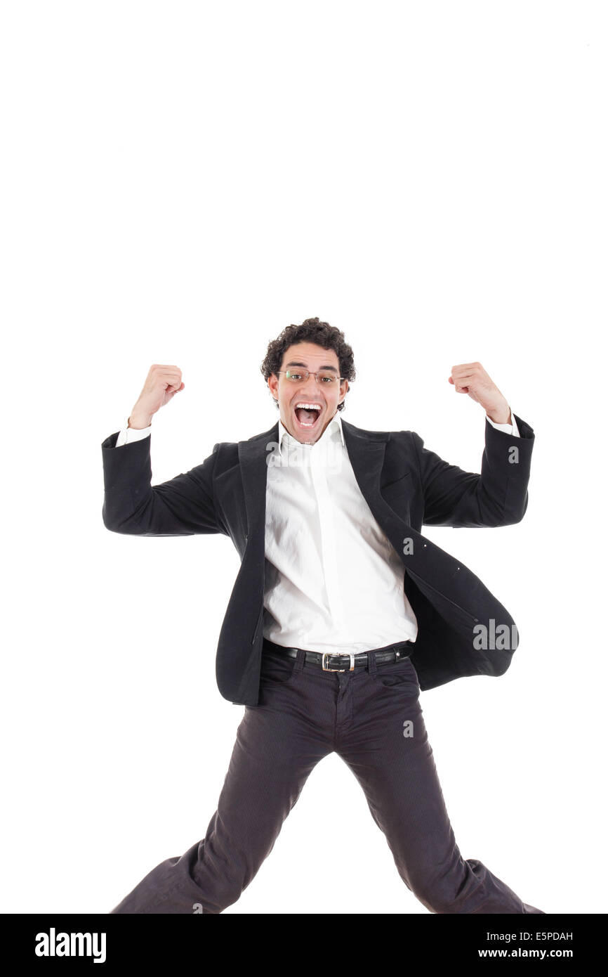 Young happy business man jumping in the air with legs spread, isolated ...