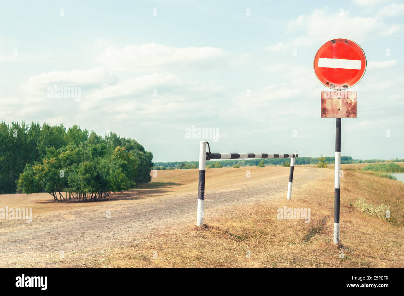 Old stop sign on a dirt road Stock Photo - Alamy