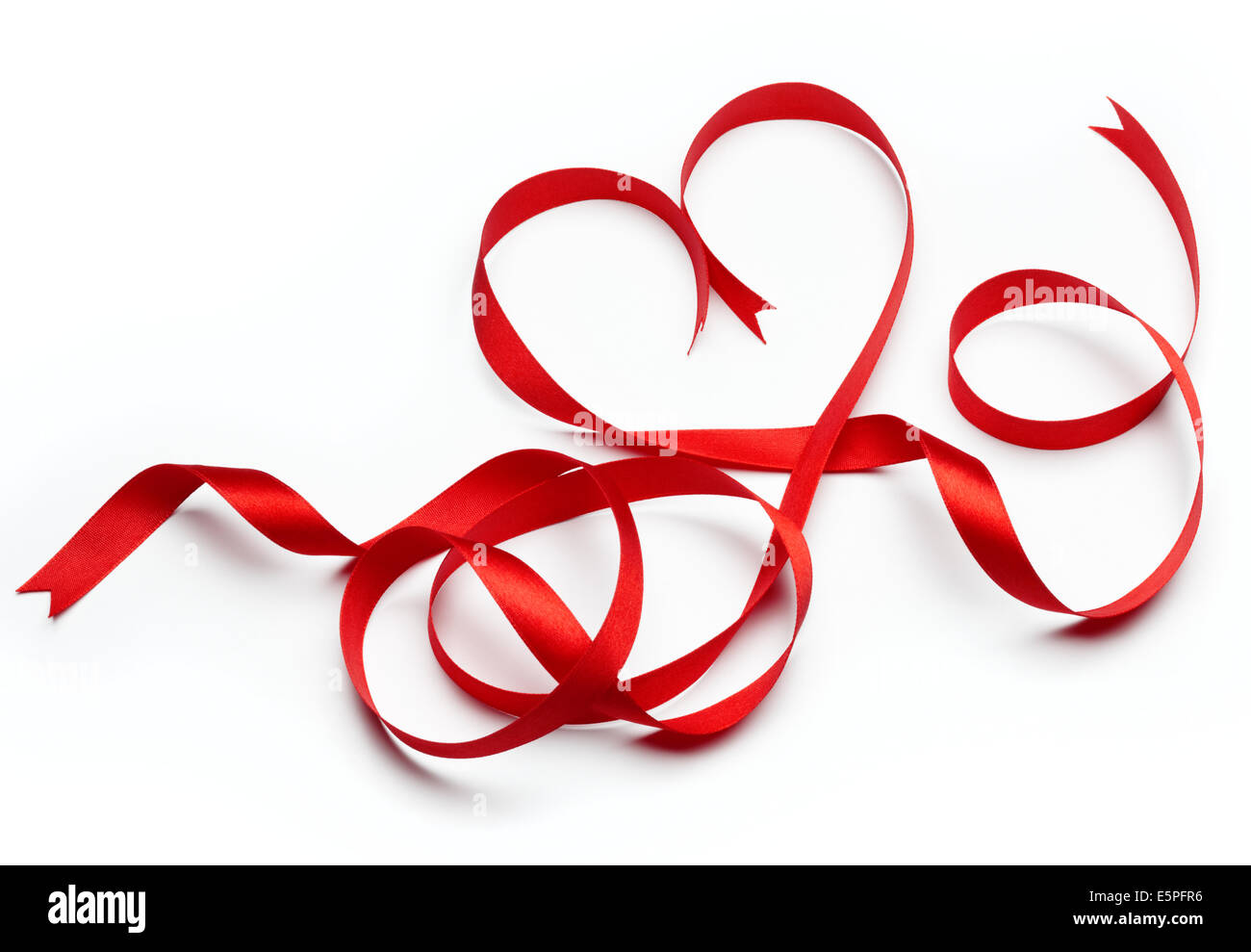 red ribbon form into a heart shape Stock Photo - Alamy