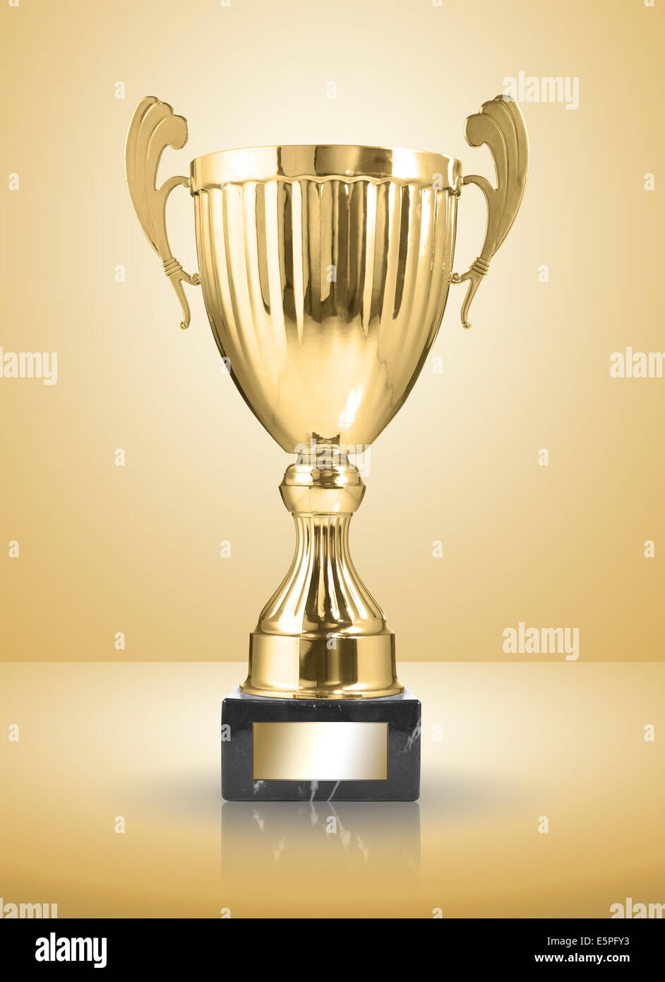 champion golden trophy Stock Photo - Alamy