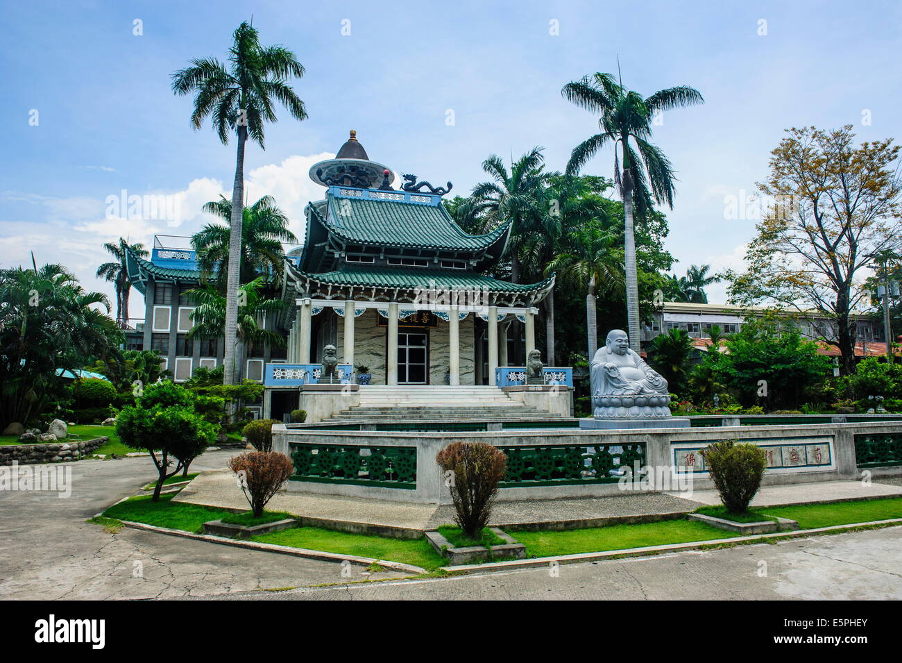 Buddhist statue in front of the Taoist temple in Davao, Mindanao ...