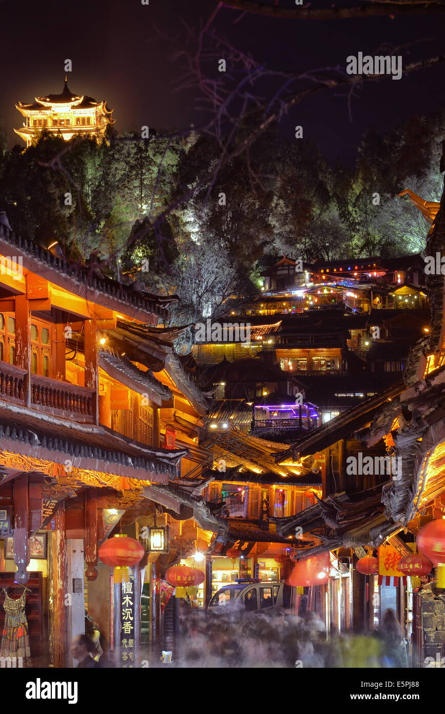 Busy Lijiang Old Town, UNESCO World Heritage Site, at night with Lion ...