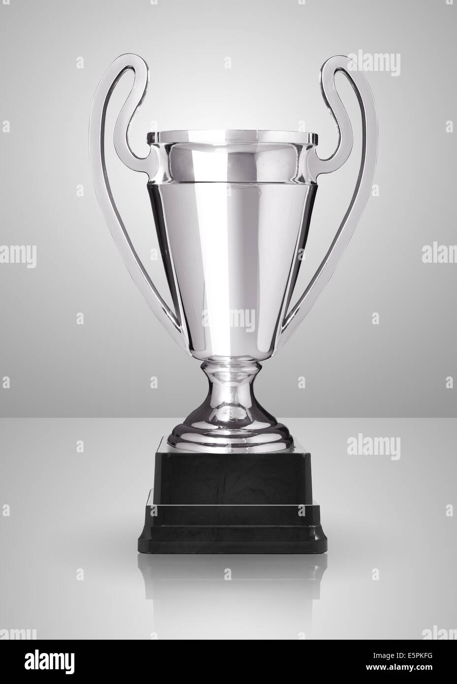 champion silver trophy over gray background Stock Photo - Alamy