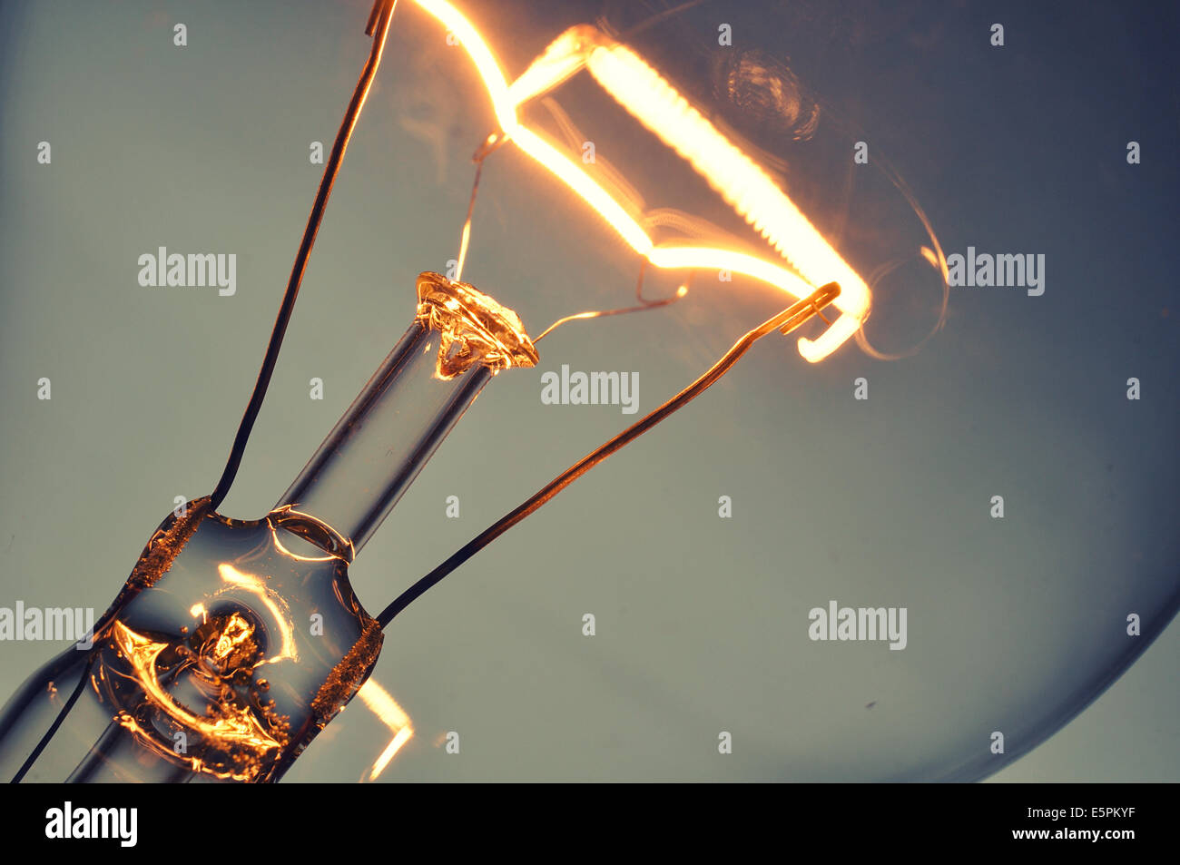Close up glowing light bulb Stock Photo - Alamy