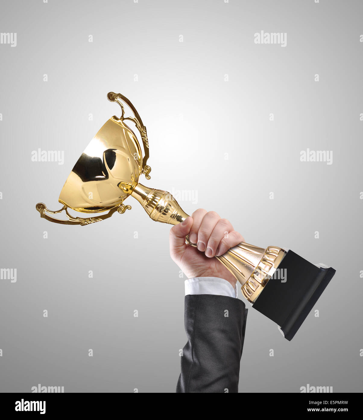 Hand holding trophy hi-res stock photography and images - Alamy