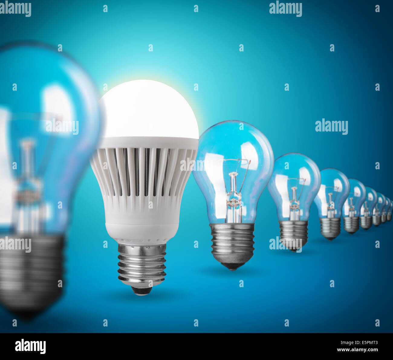Idea concept with light bulbs on blue Stock Photo - Alamy