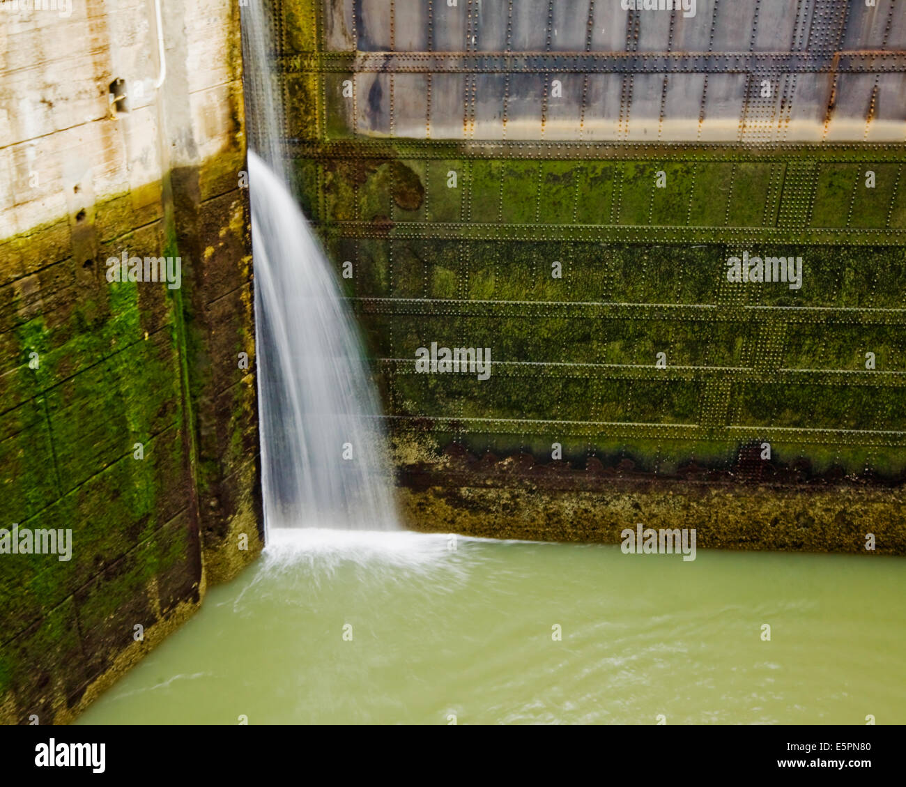 Miraflores lock gate close up with water leaking out in motion blur ...