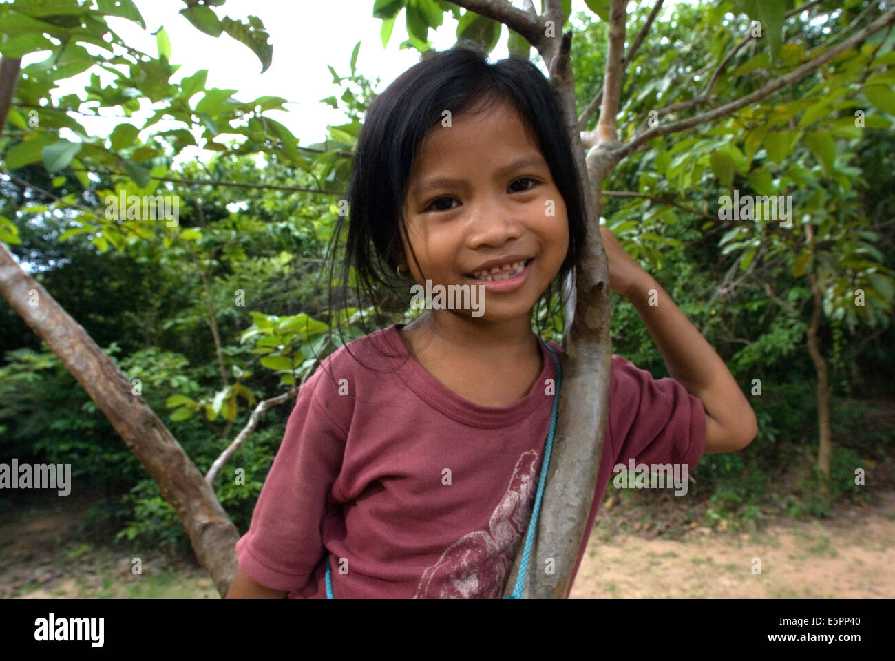 Portrait of a girl in Ta Som Temple. Ta Som is located 16.7 km from ...