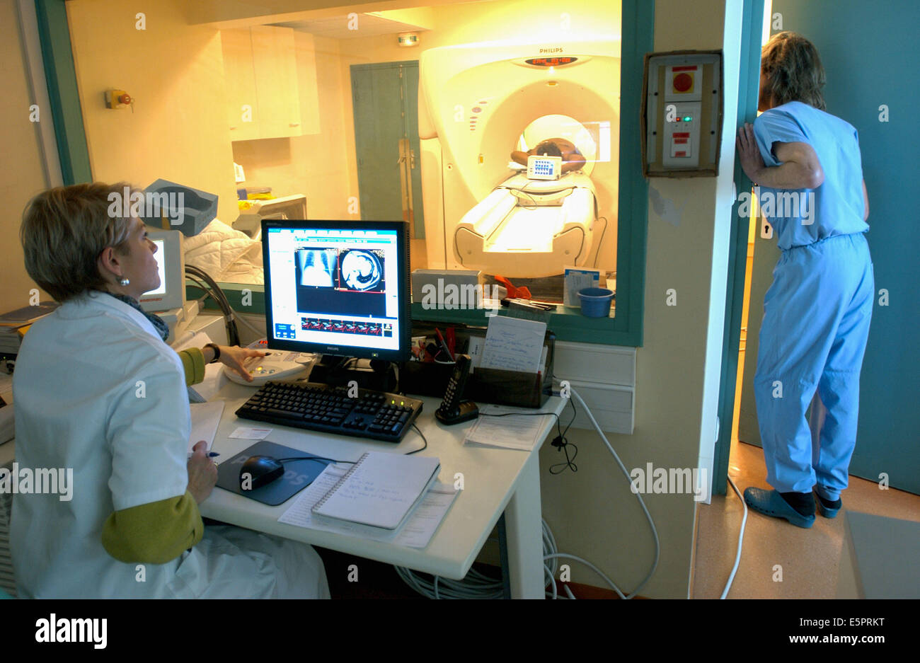 Patient undergoing a Computed Tomography (CT) scan of his heart Stock ...