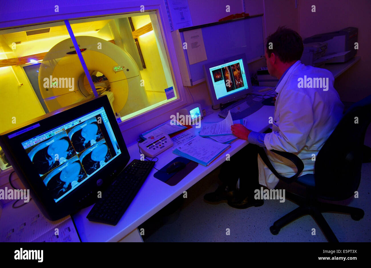Patient undergoing a positron emission tomography (PET) scan Stock ...