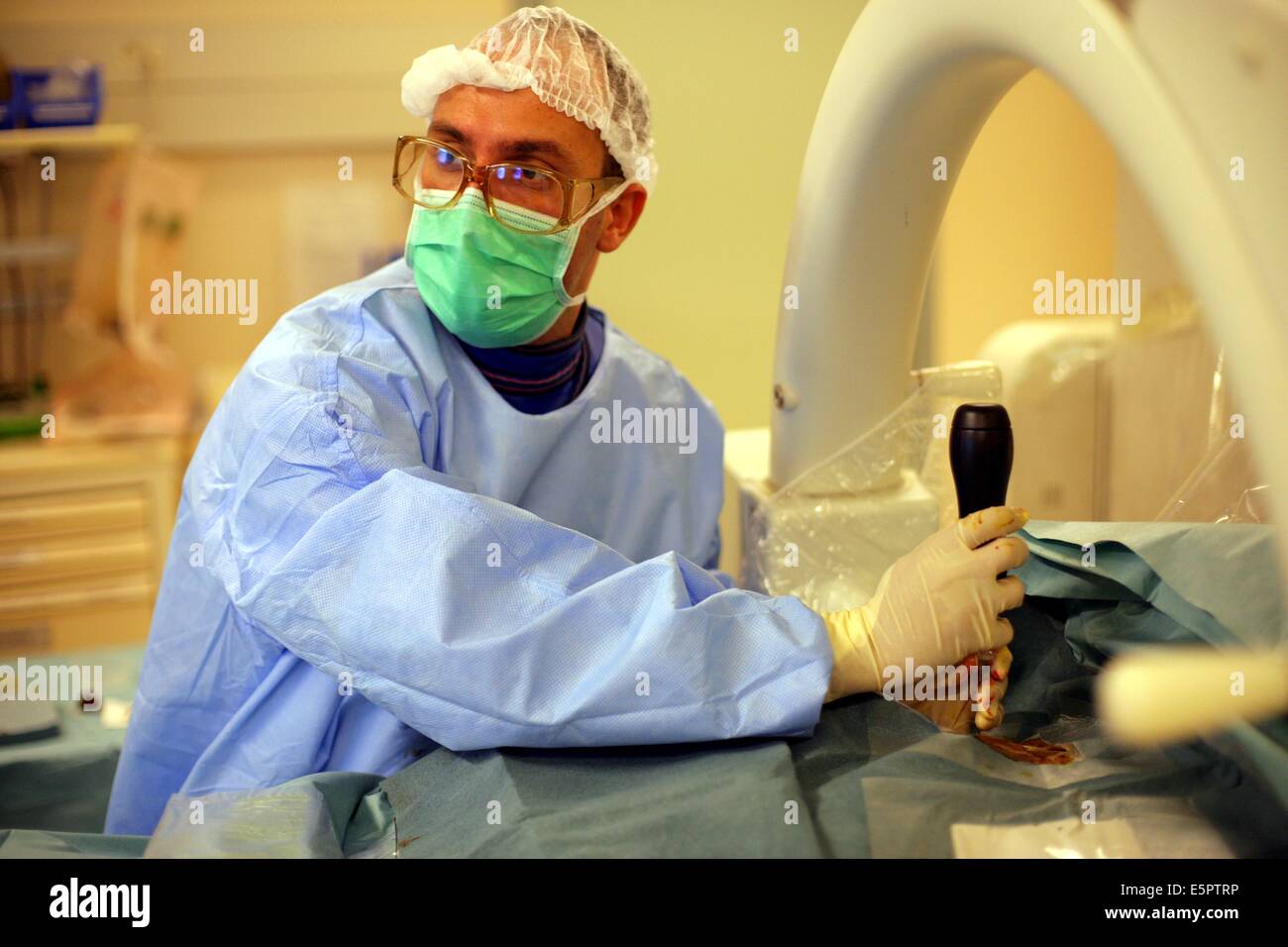 Micro-herniaectomy assisted by scanner and fluoroscopy Stock Photo - Alamy