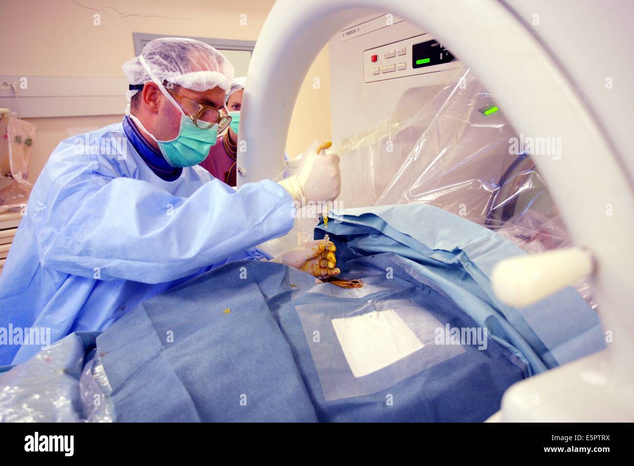 Micro-herniaectomy assisted by scanner and fluoroscopy Stock Photo - Alamy