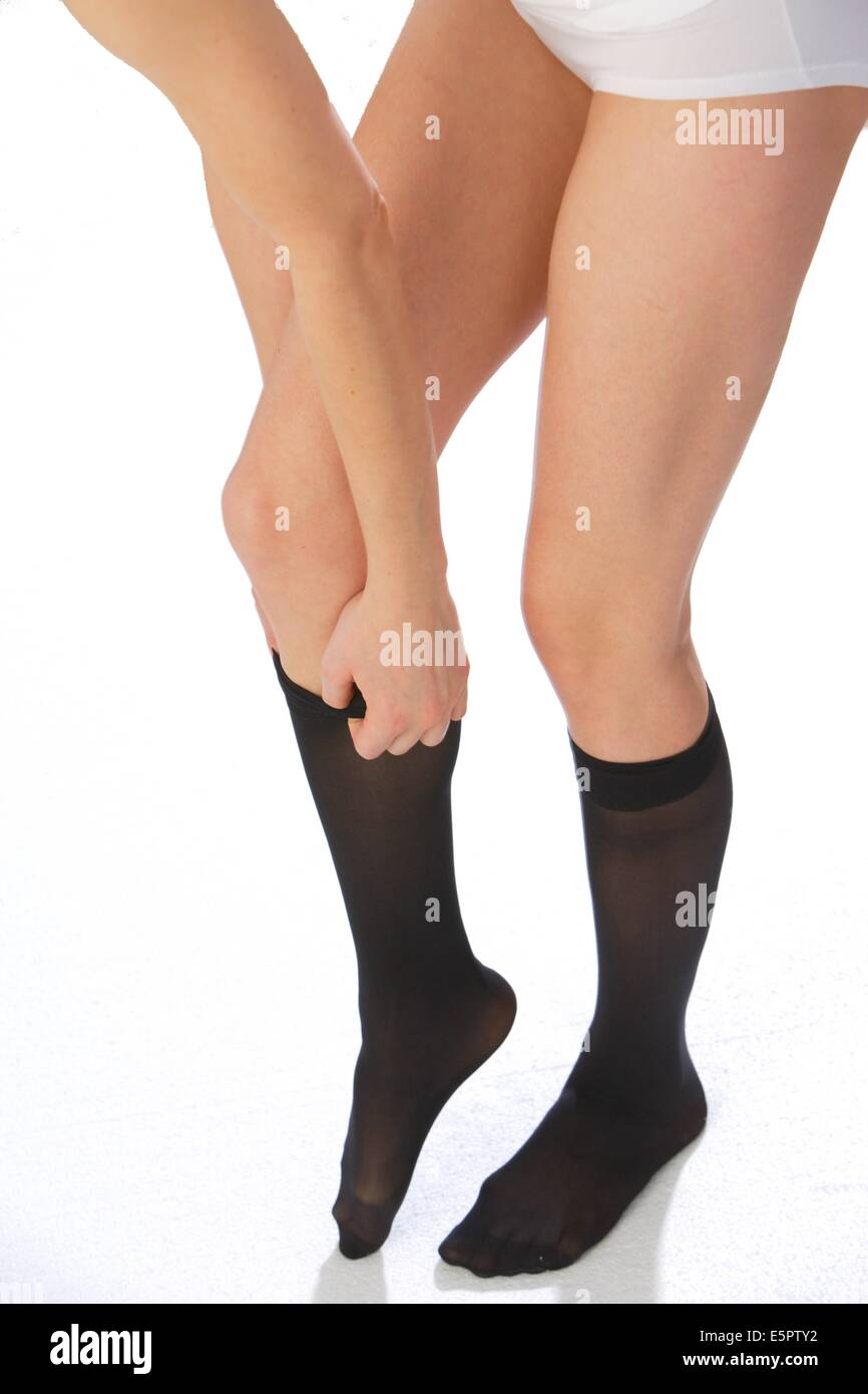 Woman wearing support socks Stock Photo - Alamy