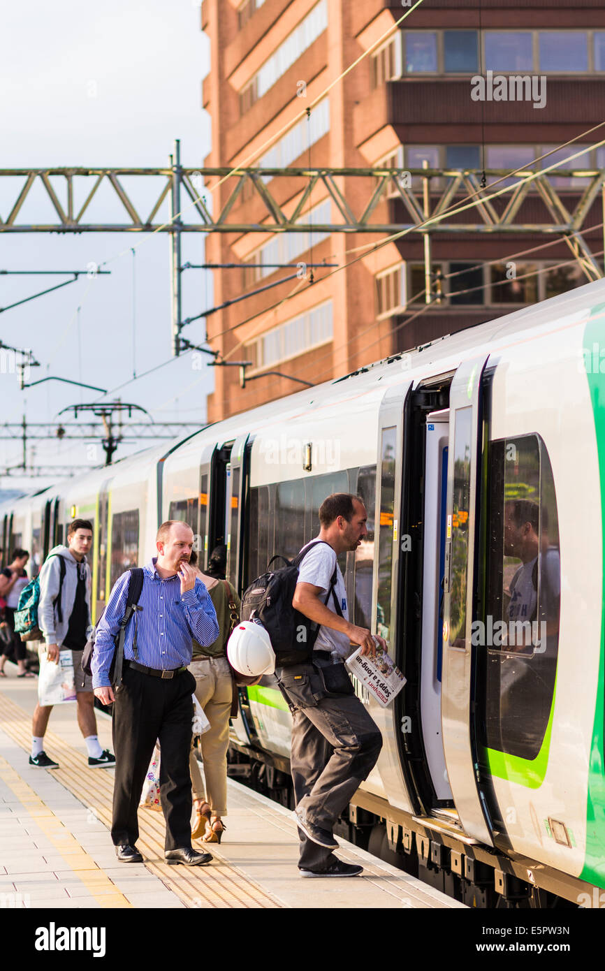 Commuters on platform at Watford Junction station Stock Photo - Alamy