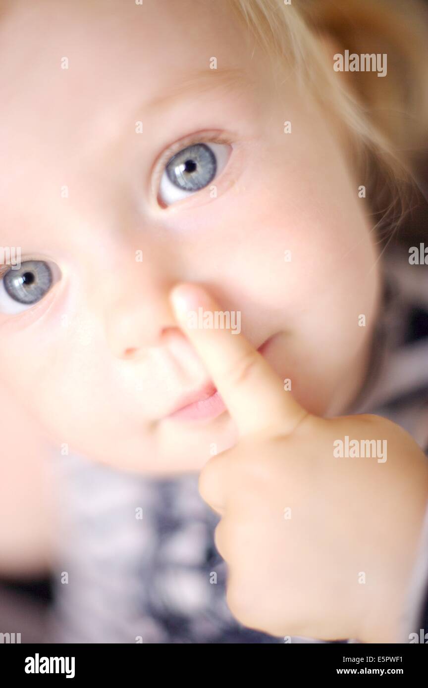 Child touching nose one person hi-res stock photography and images - Alamy
