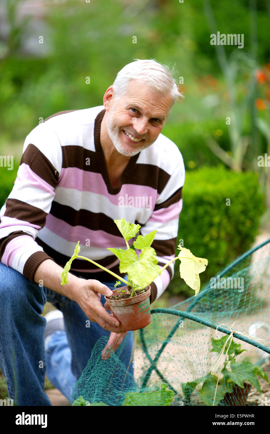 50 year old man gardening hi-res stock photography and images - Alamy
