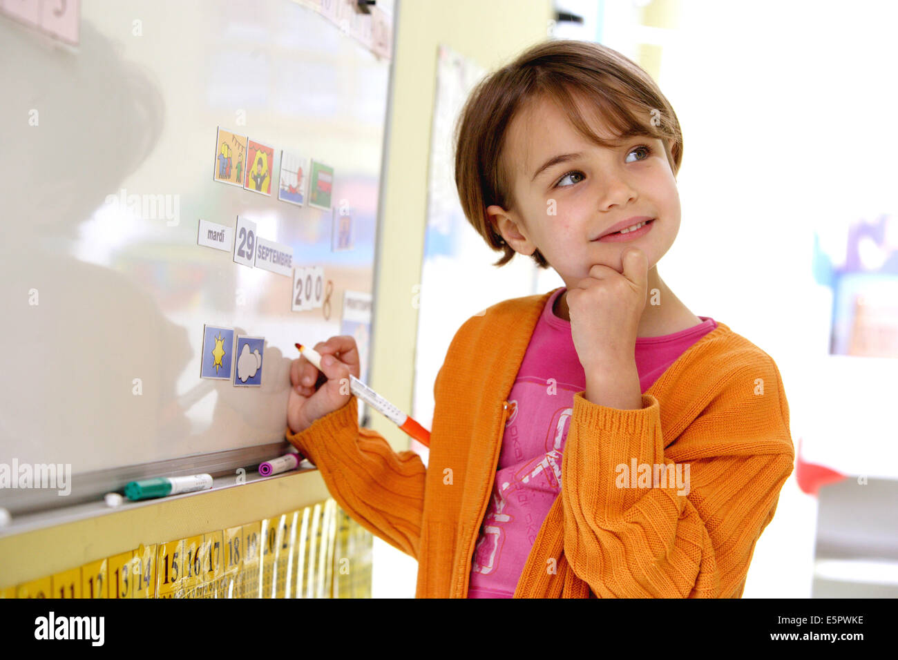 6 year old child at school Stock Photo - Alamy