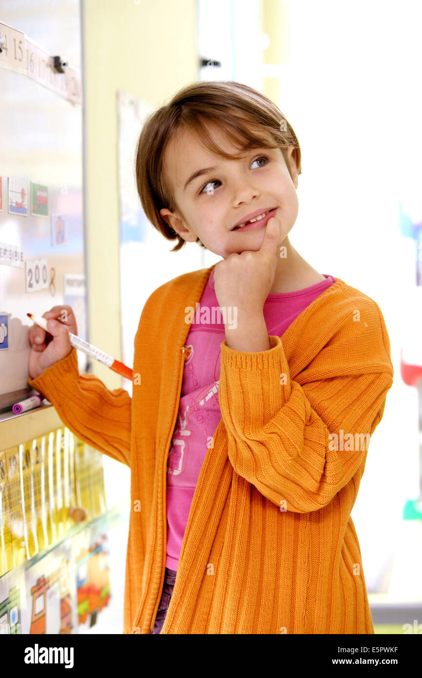 6 year old child at school Stock Photo - Alamy