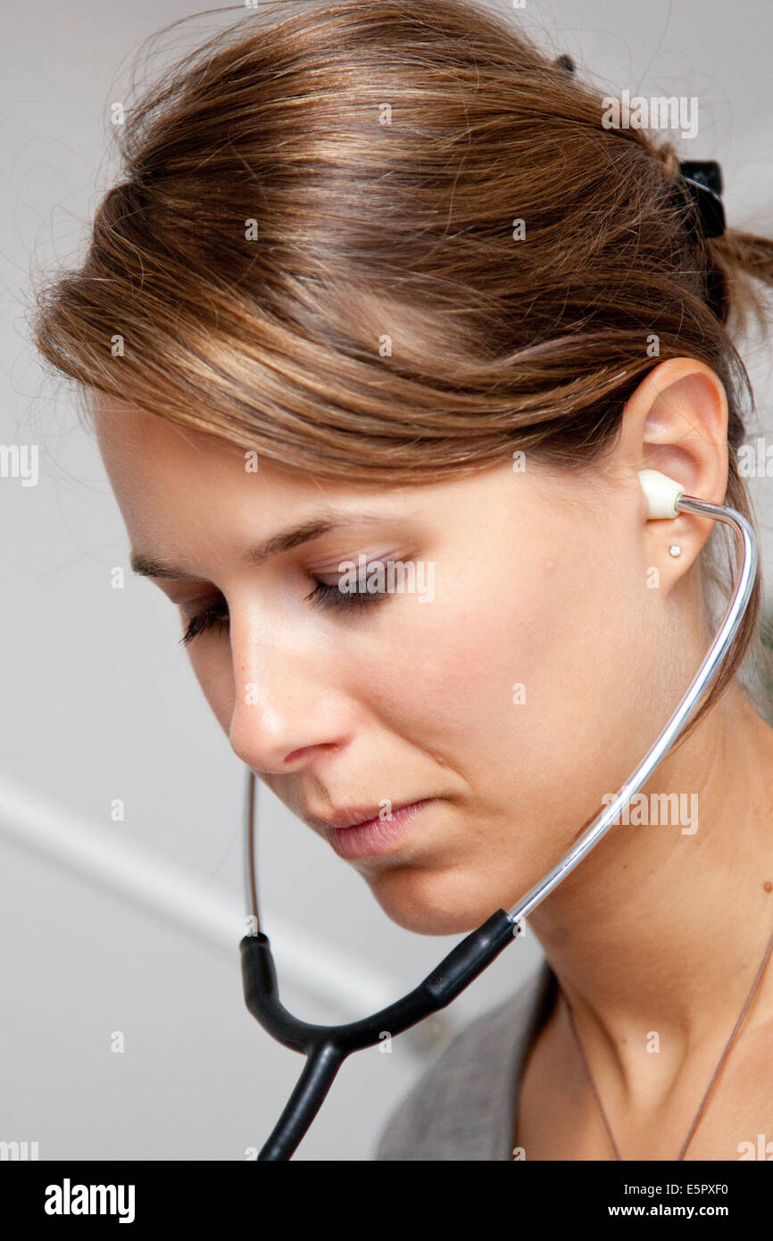 A student doctor at her 6th year of medical study in training Stock ...