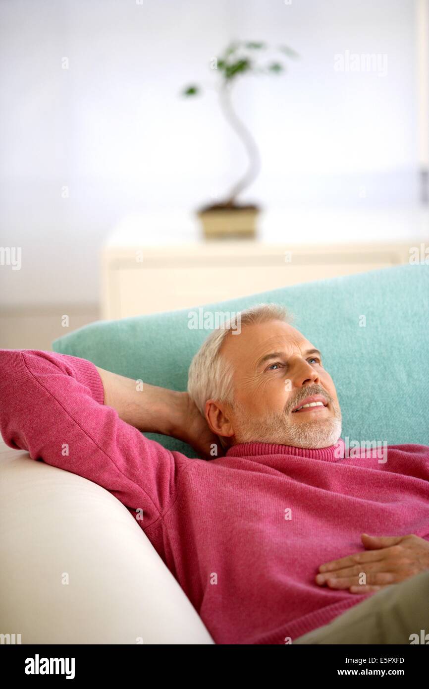 Middle aged man resting Stock Photo - Alamy