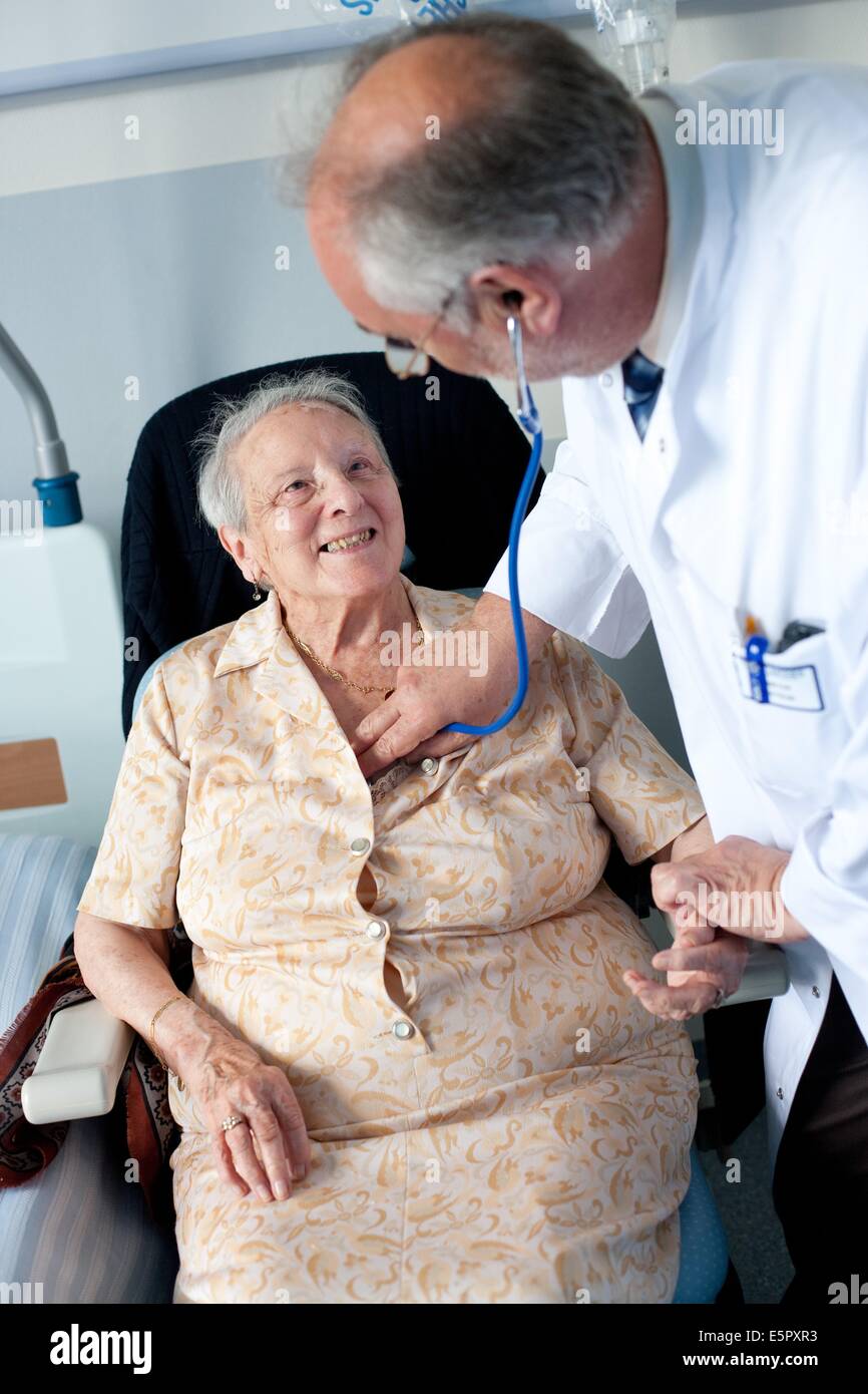 Elderly patient in consultation with a gerontologist; Residential home ...