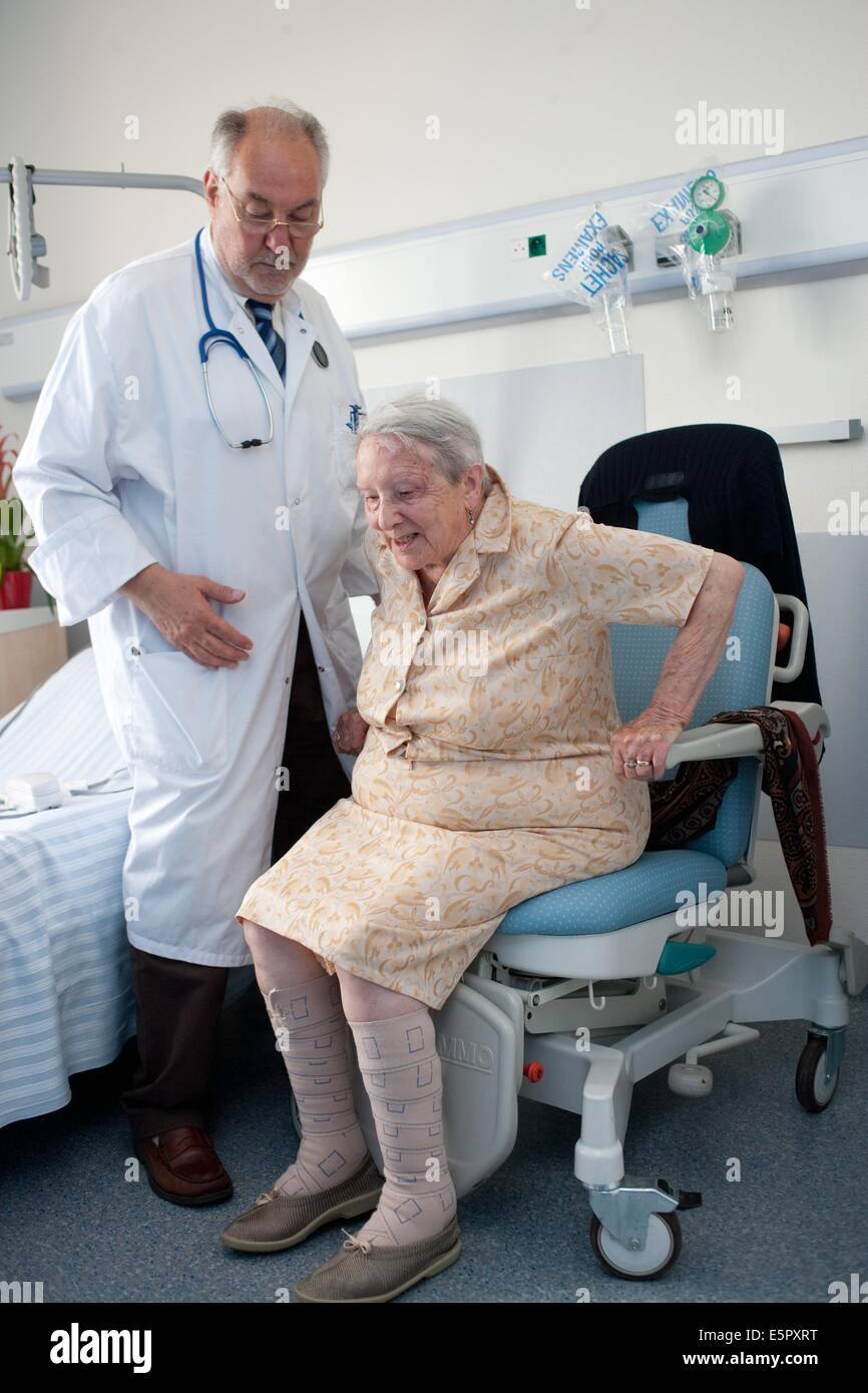 Elderly patient in consultation with a gerontologist; Residential home ...