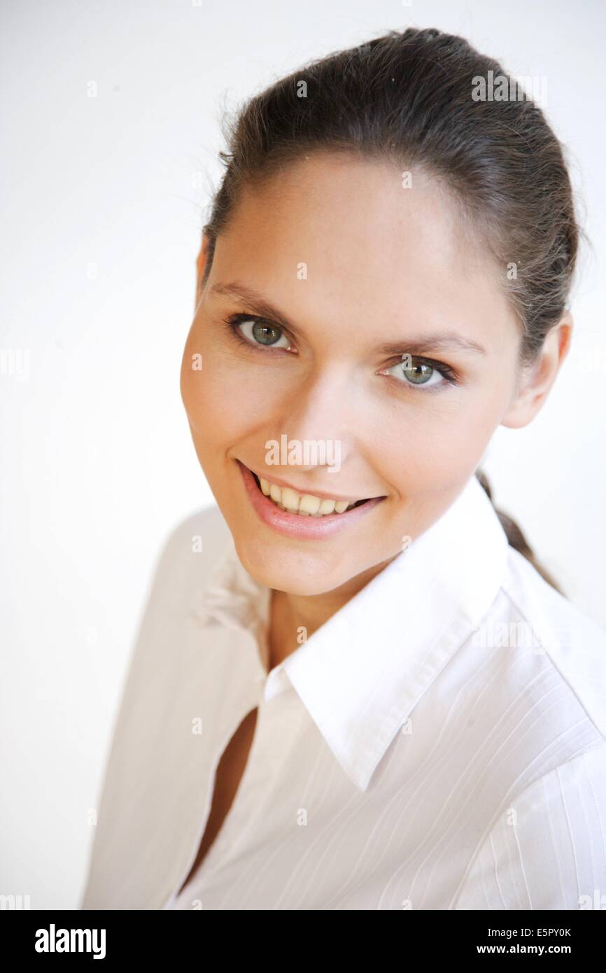 Portrait of smiling woman Stock Photo - Alamy
