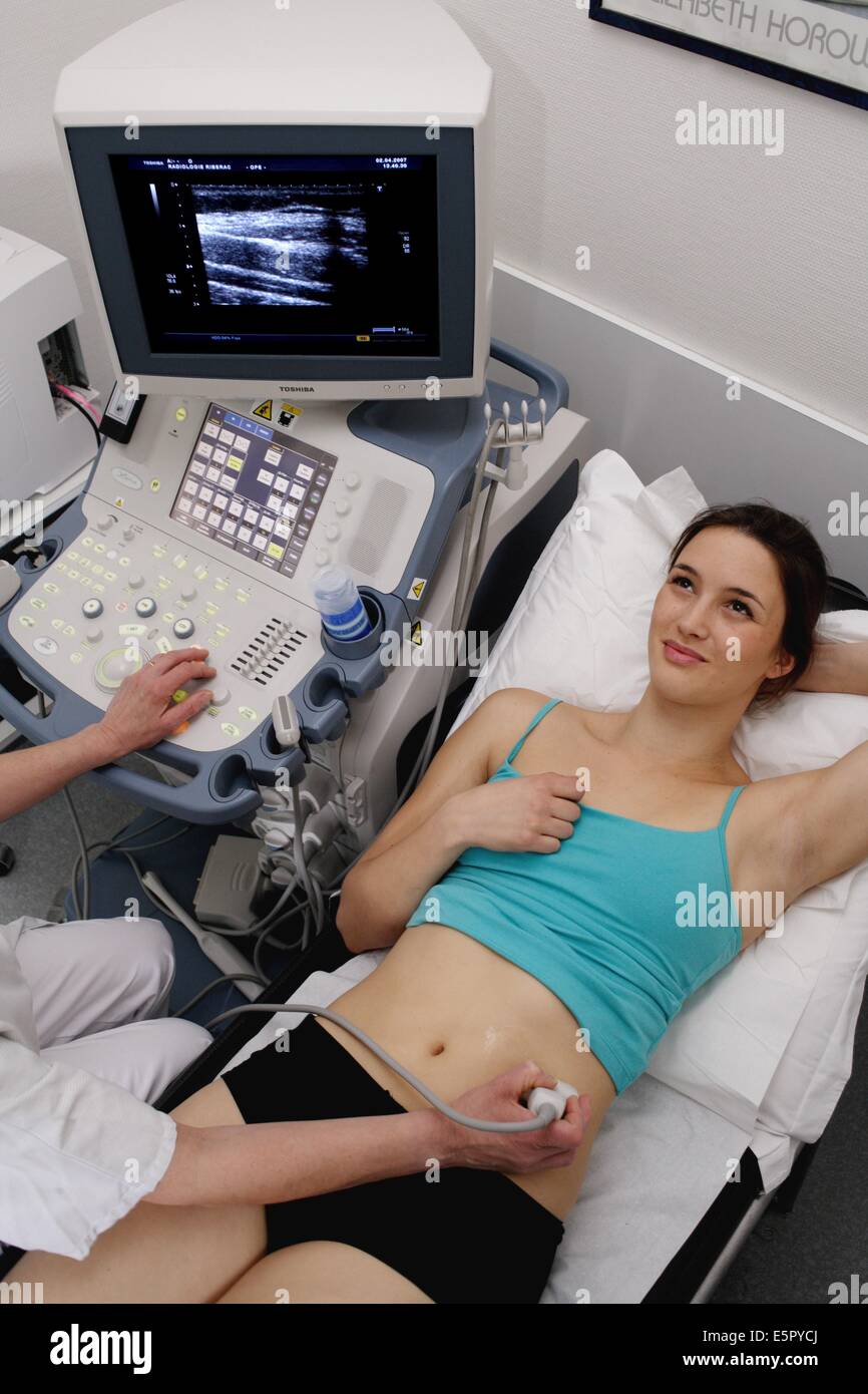 Woman undergoing abdominal ultrasound scan hi-res stock photography and images - Alamy
