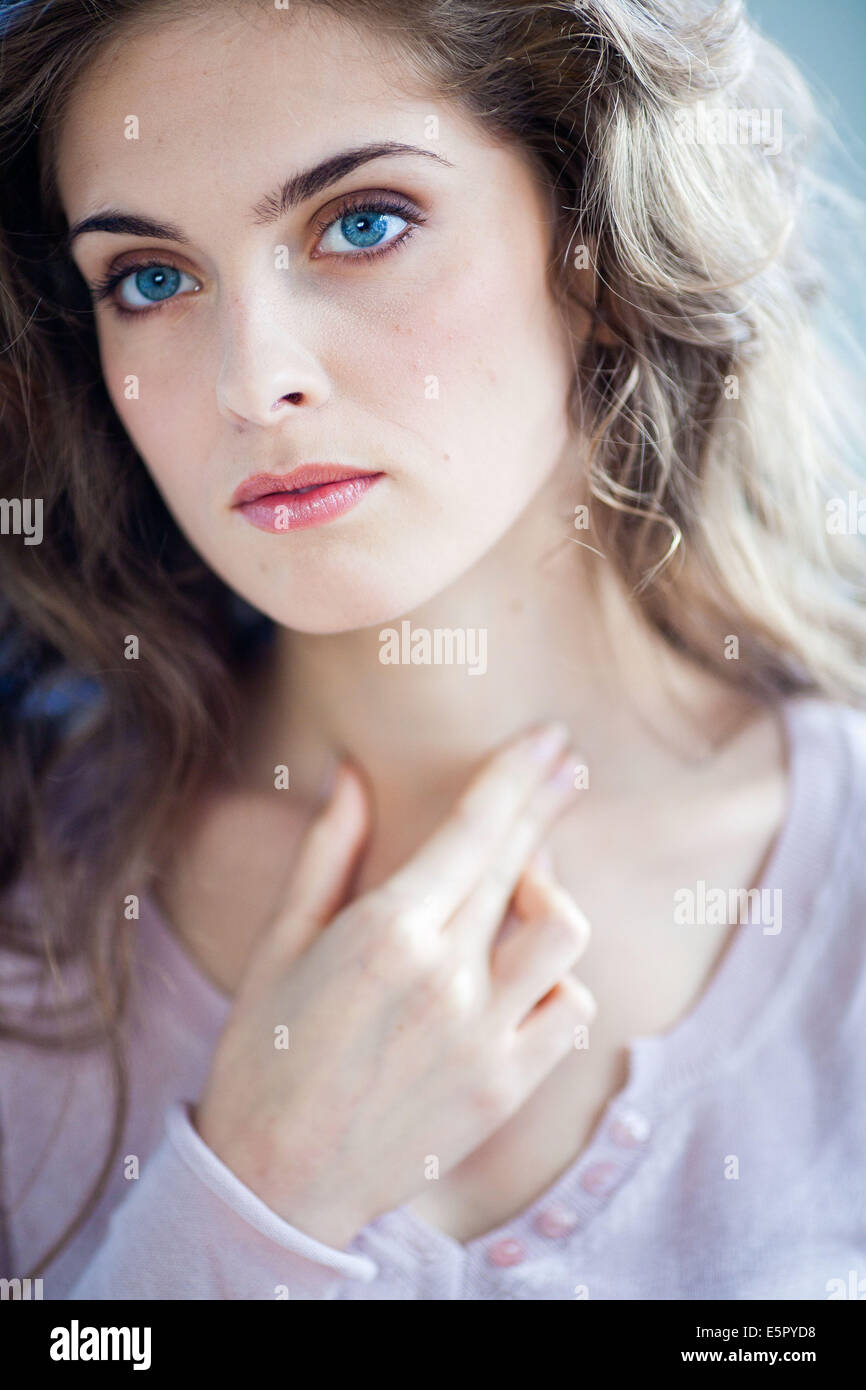 Woman self-examining her throat Stock Photo - Alamy