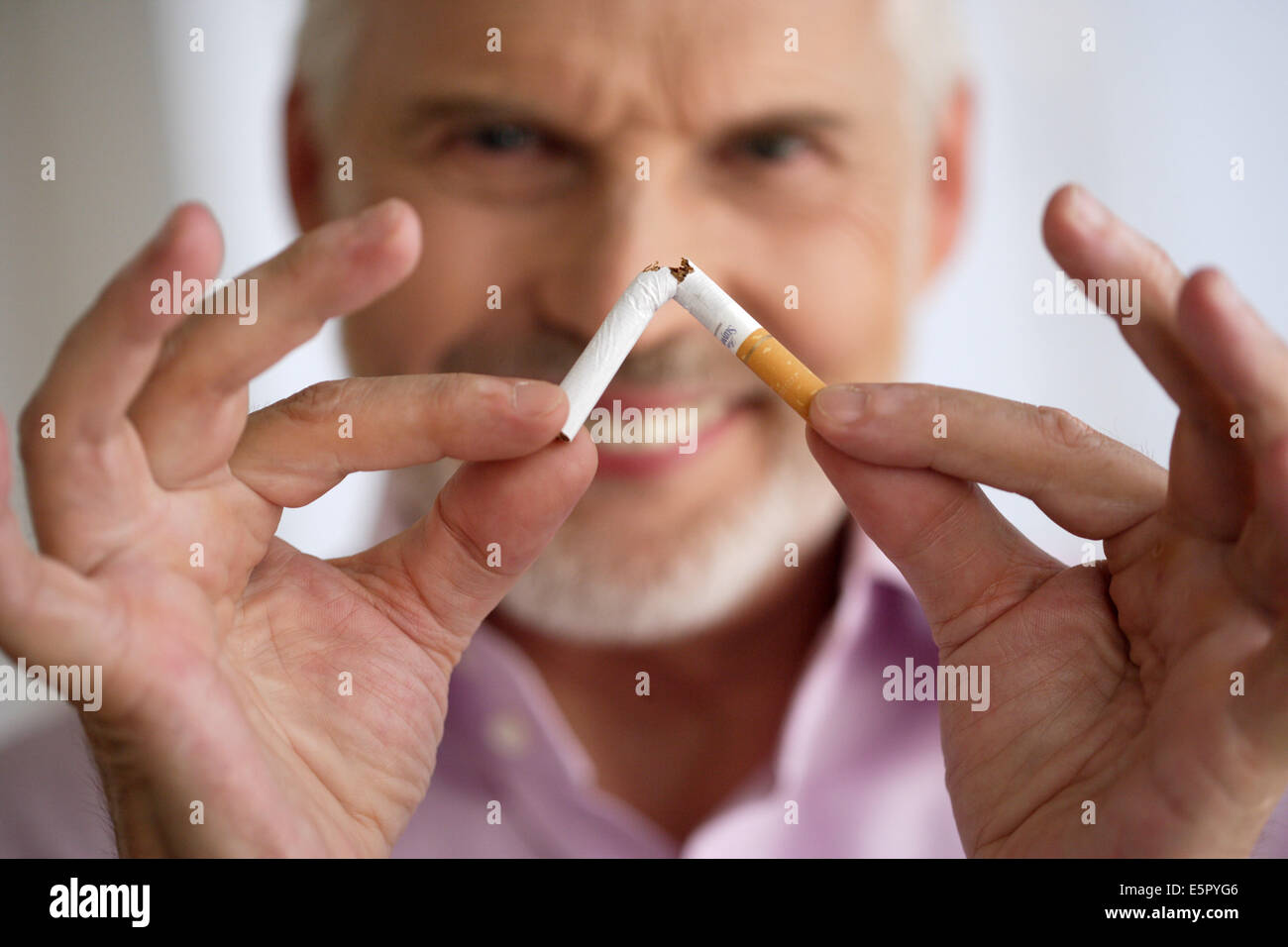 Man wishing to quit smoking Stock Photo - Alamy