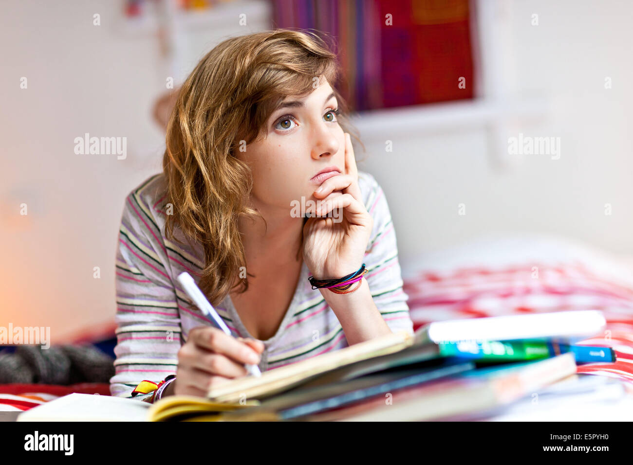 Teenage girl revising exams Stock Photo - Alamy