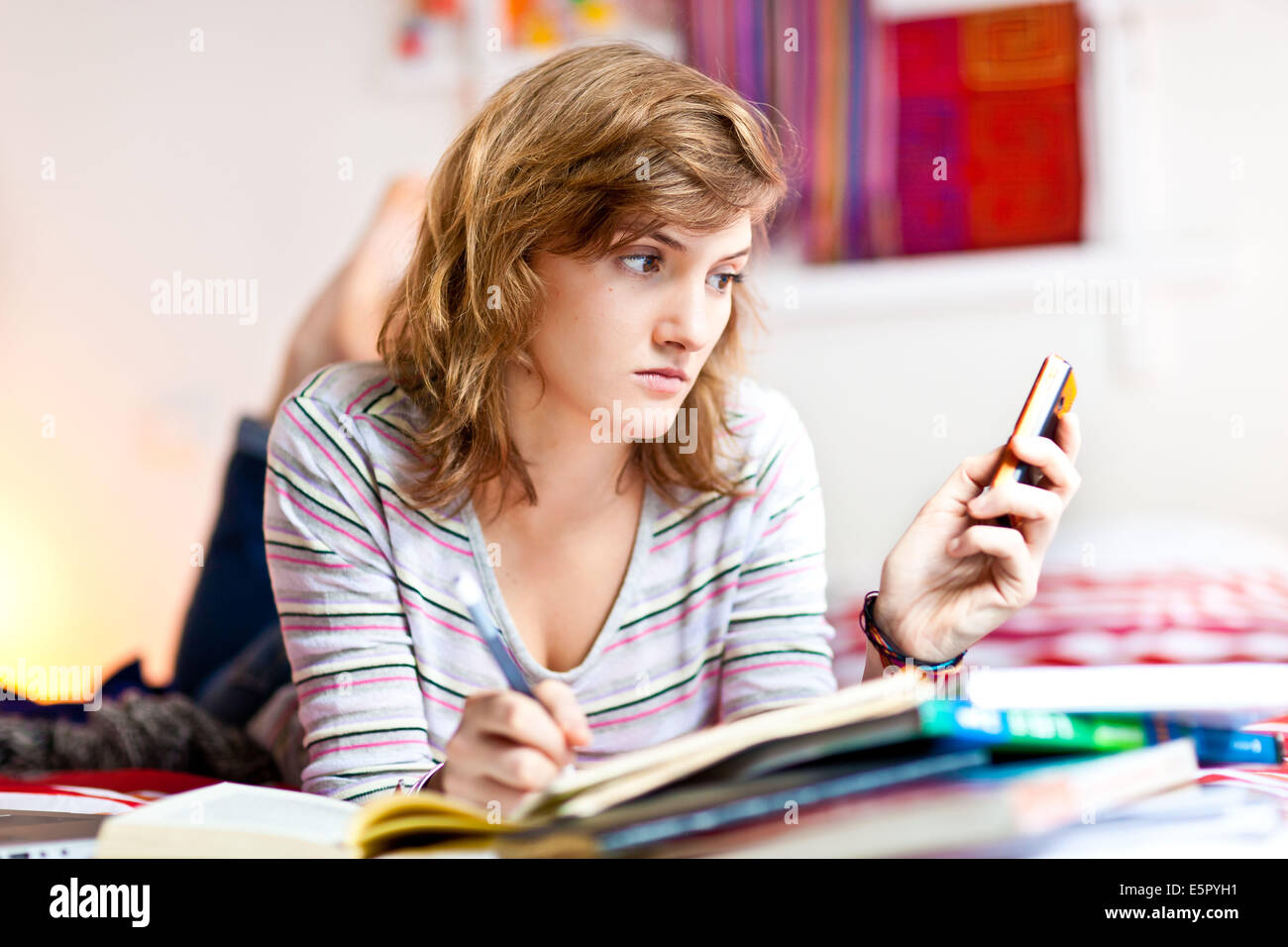 Teenage girl revising exams Stock Photo - Alamy