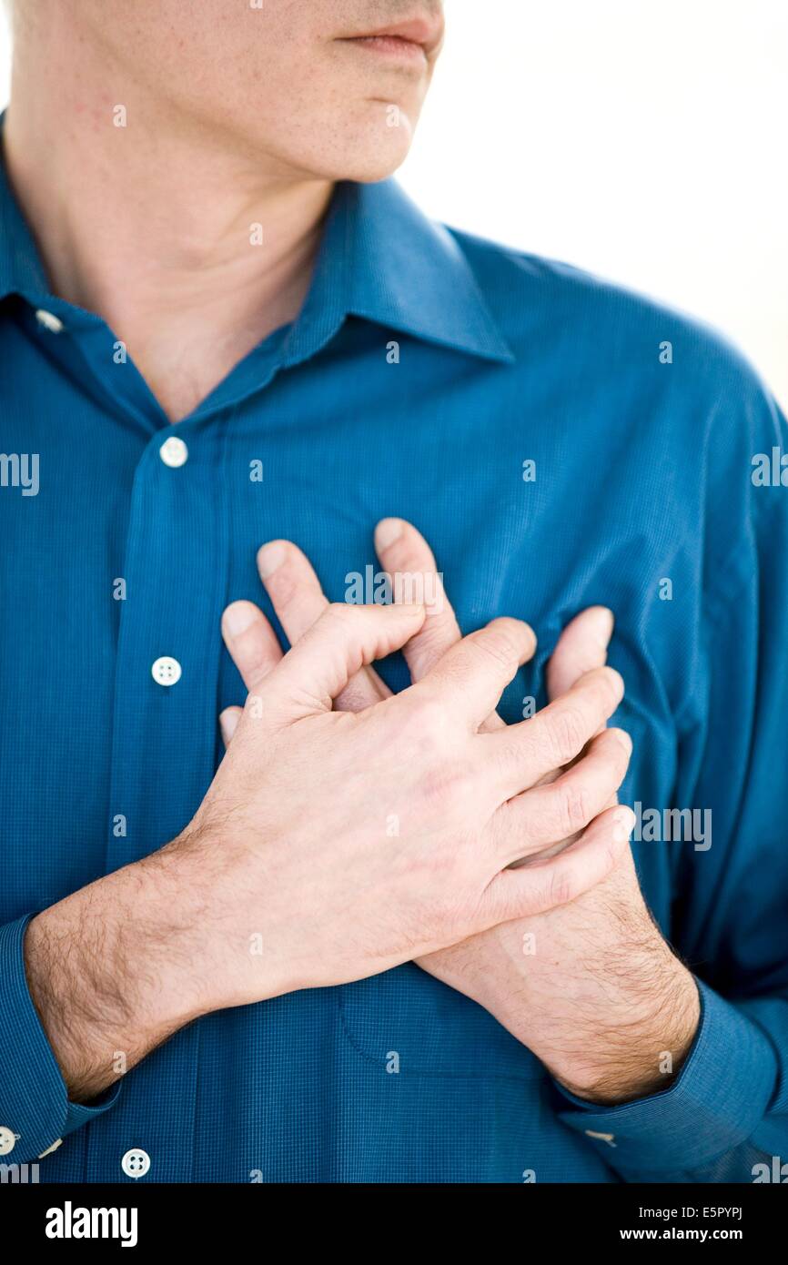 Man having a heart attack Stock Photo - Alamy
