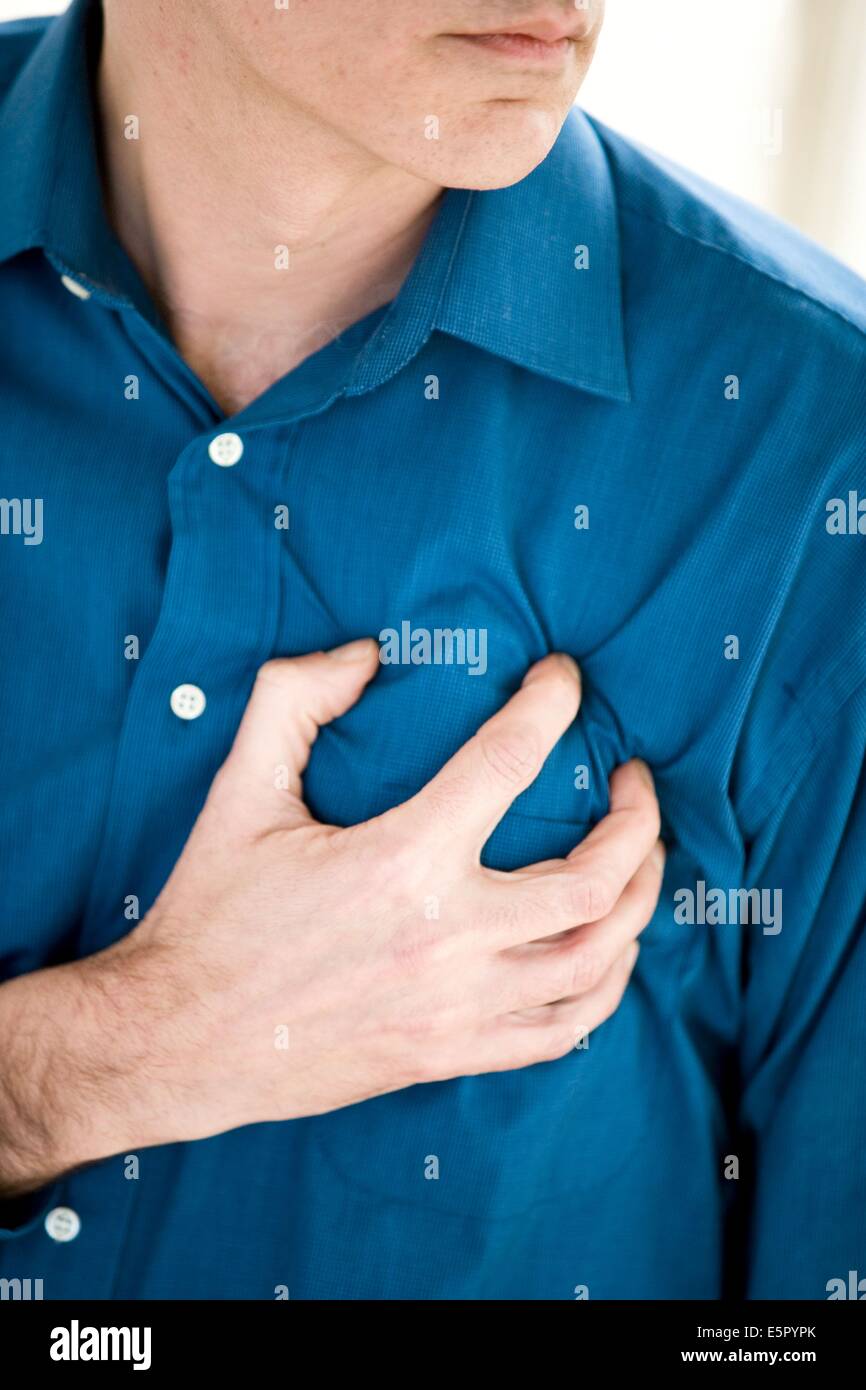 Man having a heart attack Stock Photo - Alamy
