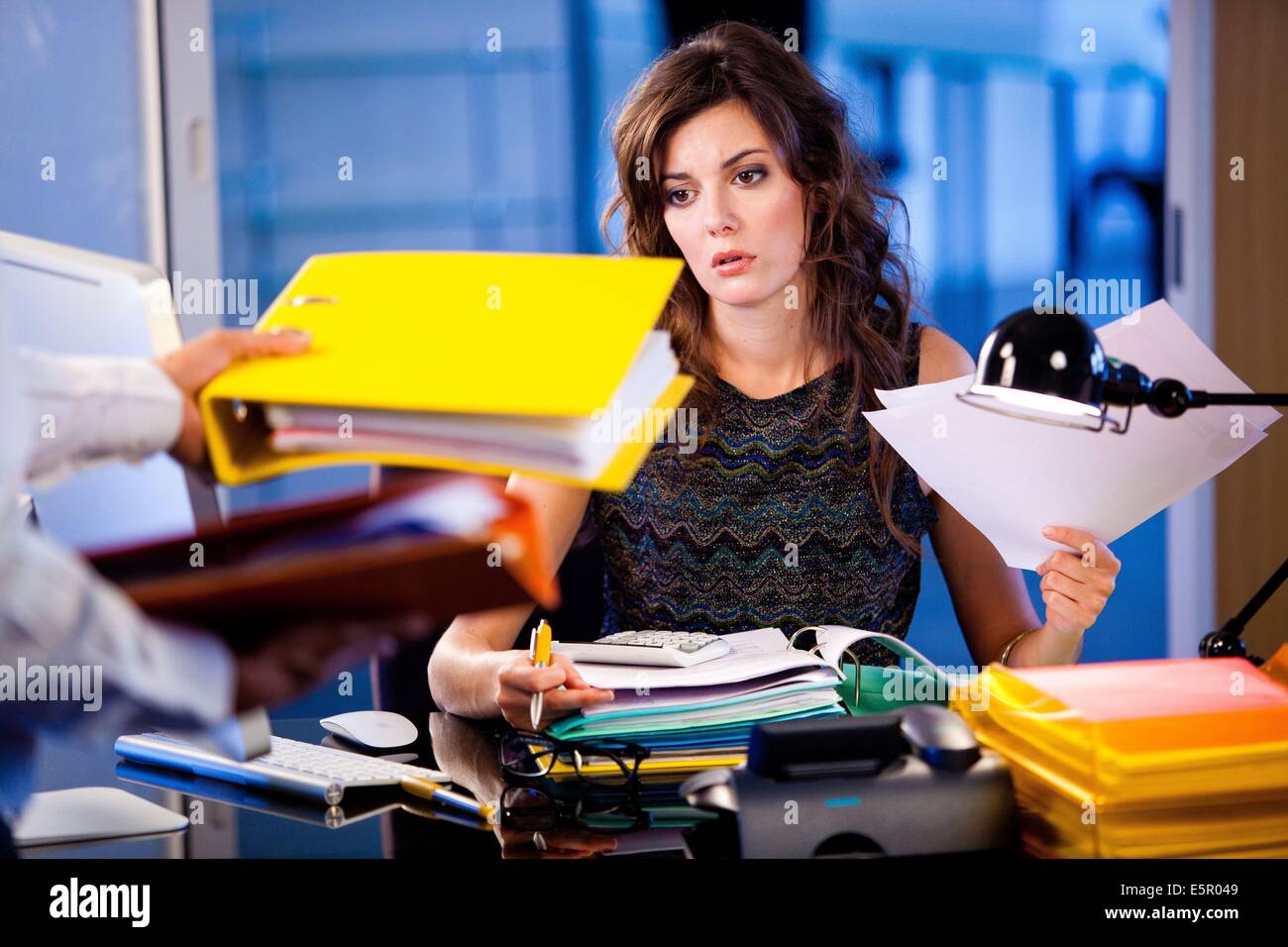 Stressed woman at work Stock Photo - Alamy