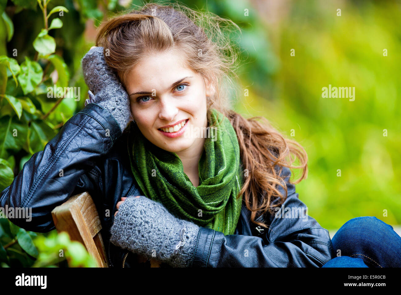 Woman smiling outdoors Stock Photo - Alamy